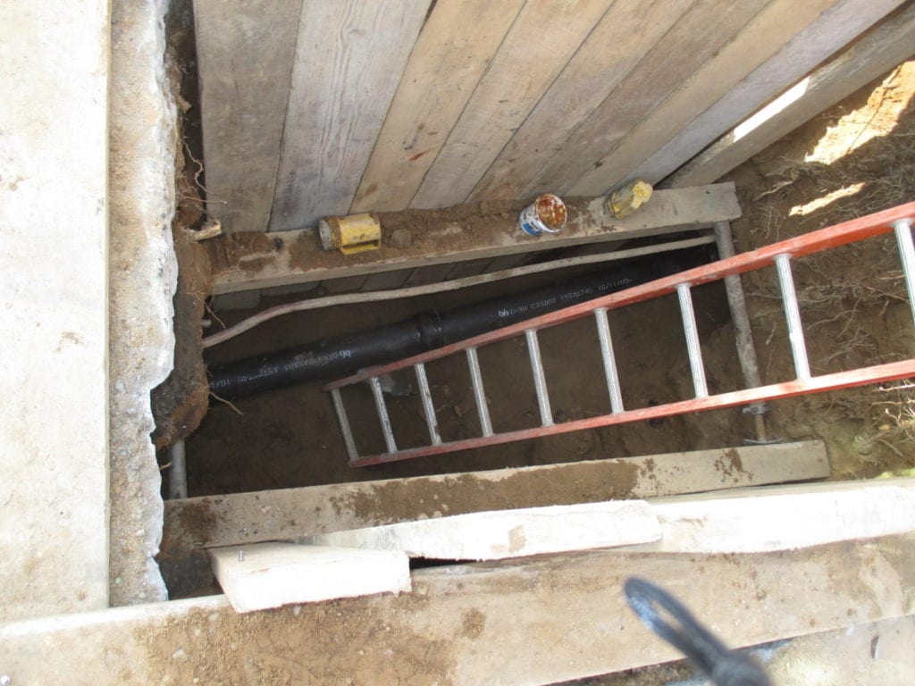 Street Plumbing into Building NYC - harriswatermain
